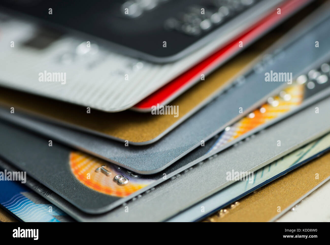 Stack of multicolored credit cards close-up Stock Photo - Alamy