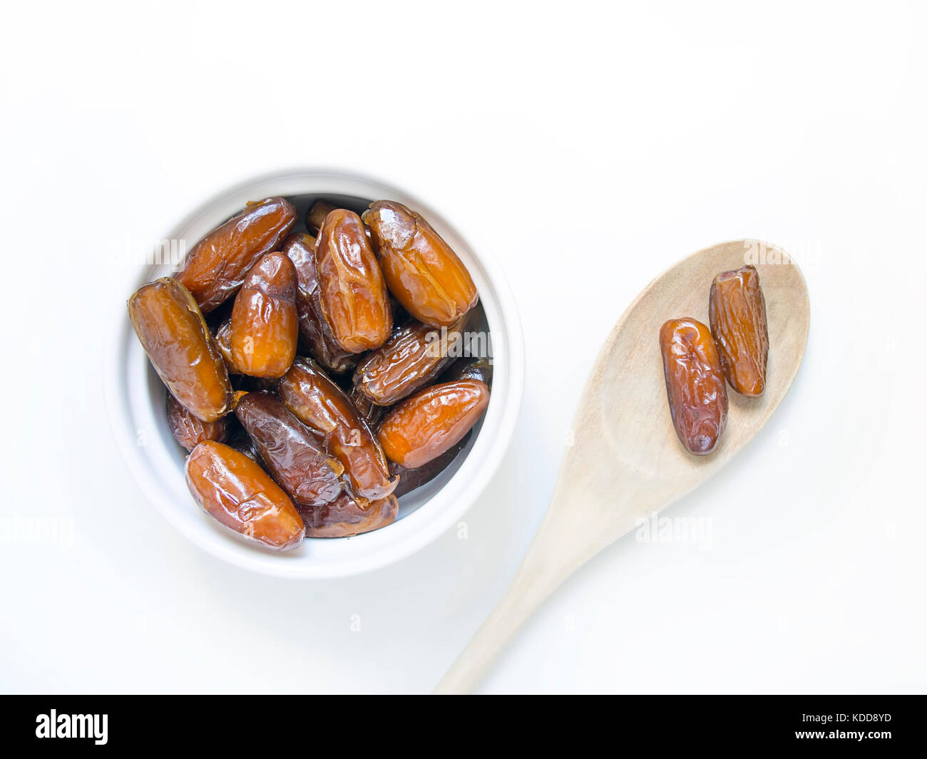 Dates fruit top view on white background Stock Photo - Alamy