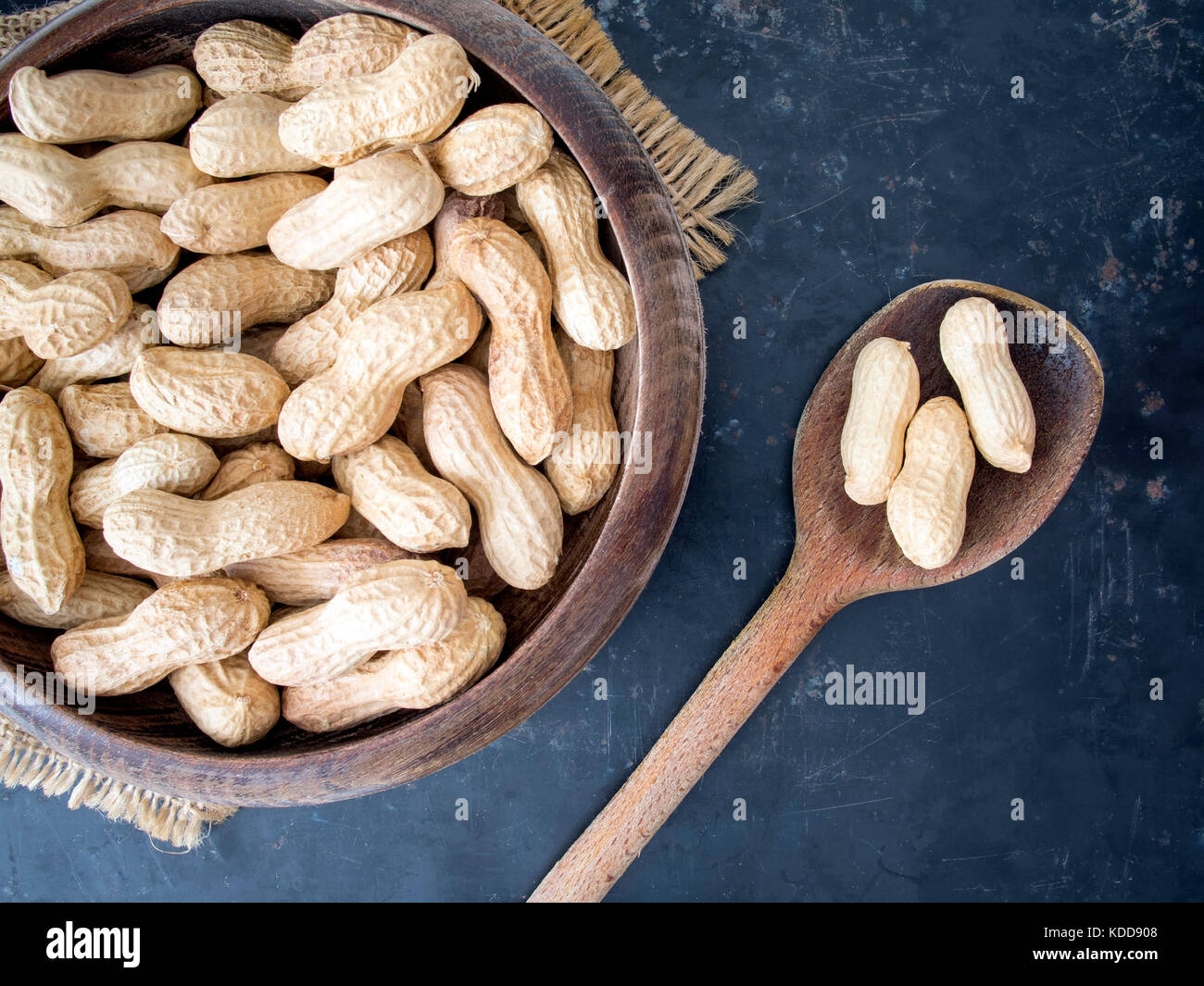 Peanut on dark rustic background top view Stock Photo - Alamy