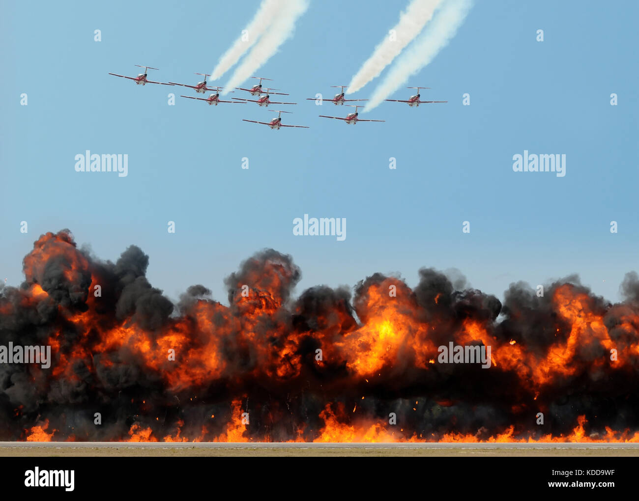 Team of jetfighters dropping bombs with fire and smoke Stock Photo - Alamy
