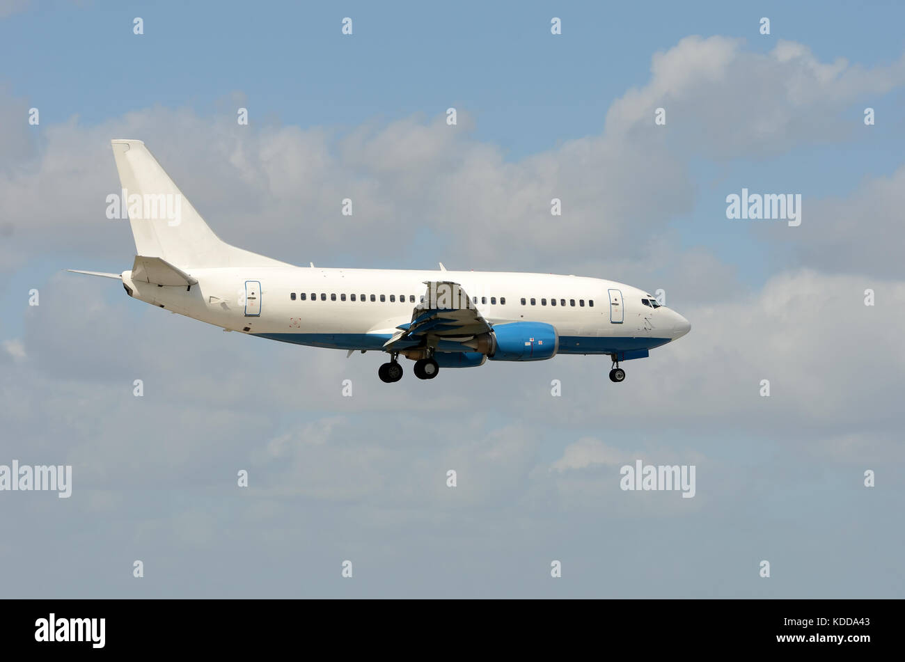 Modern passenger jet airplane side view Stock Photo - Alamy