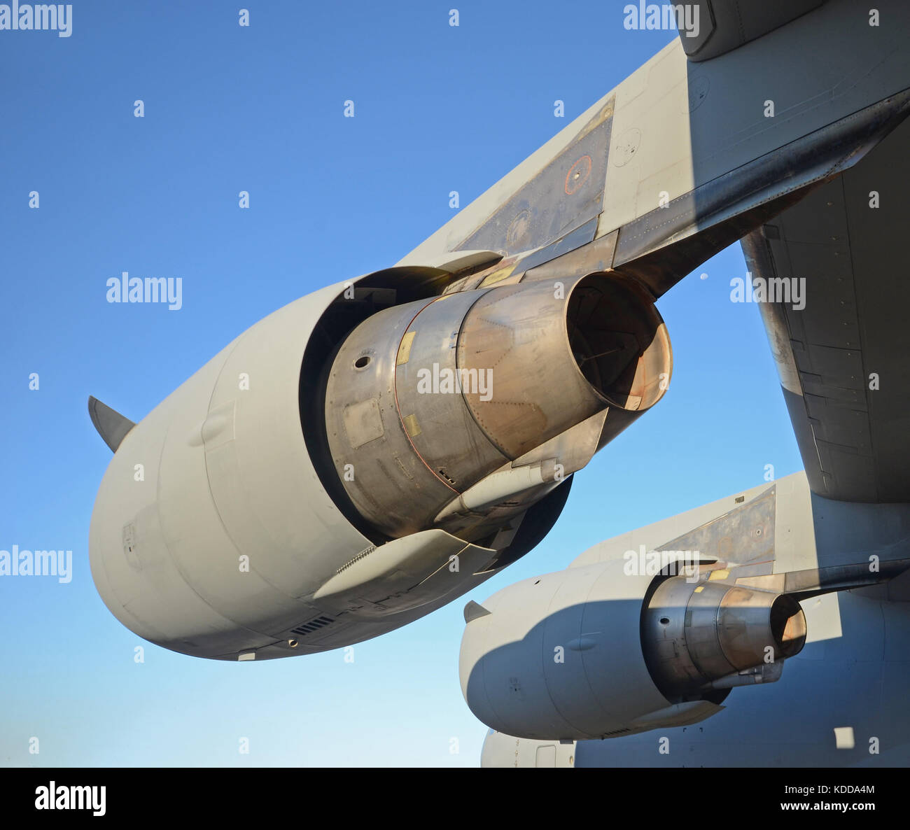 Modern military transport airplane wing and engines view Stock Photo ...