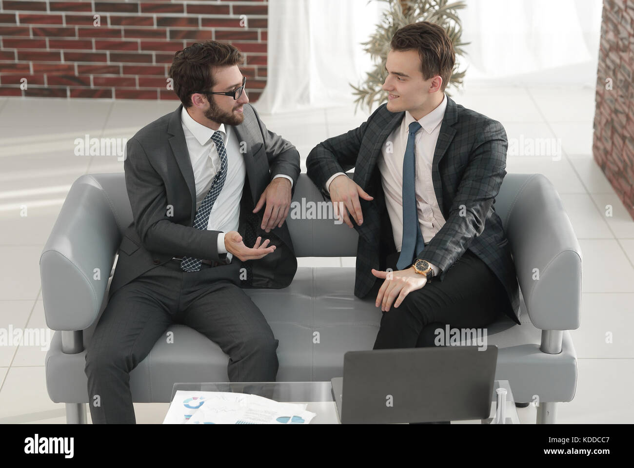 business partners talking at the office Stock Photo - Alamy
