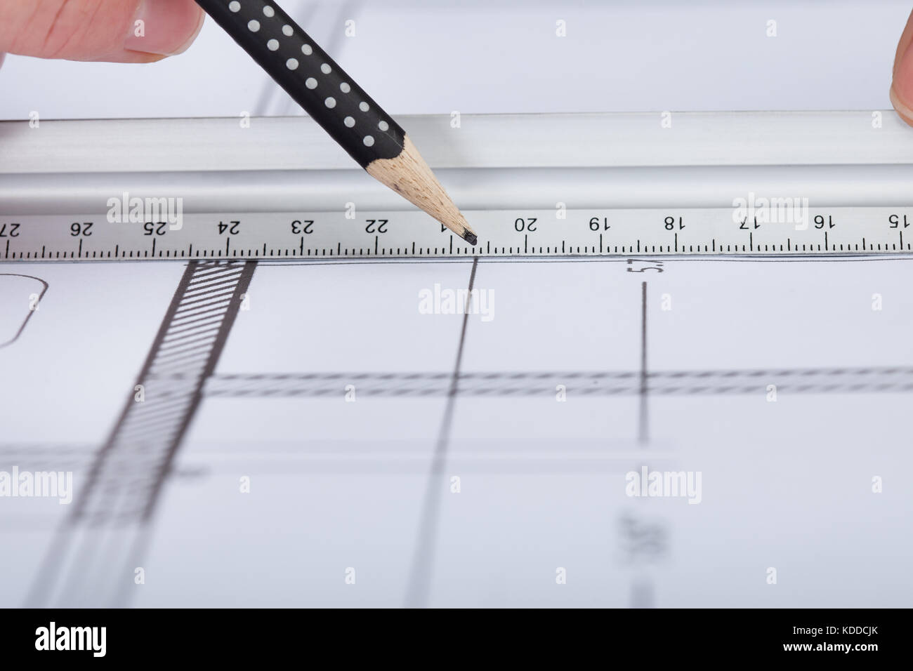 Close-up Of Person's Hand Drawing Plan On Blue Print Stock Photo - Alamy