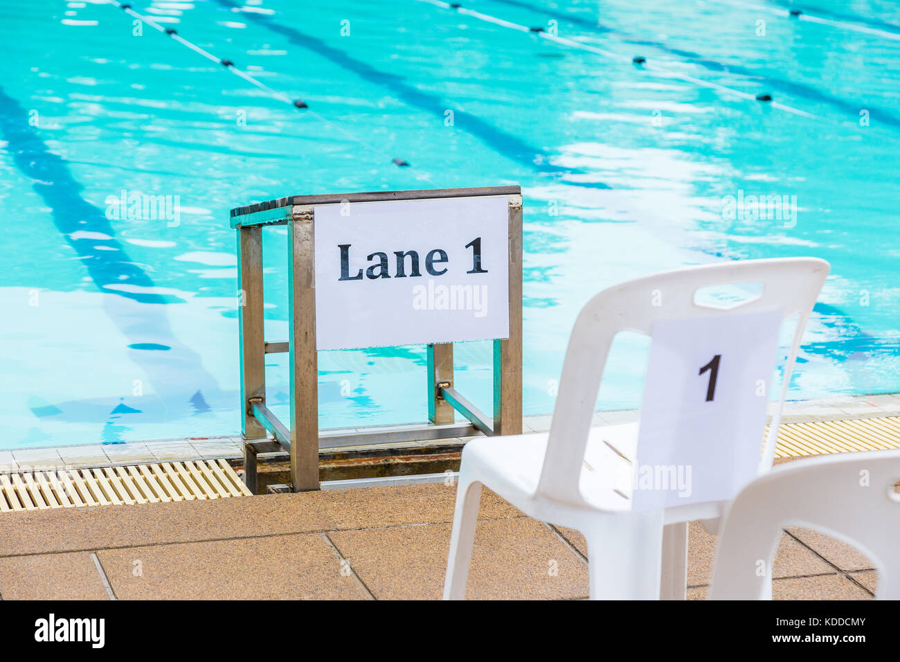 swimming lane 1 sign posted at a school swimming competition Stock ...
