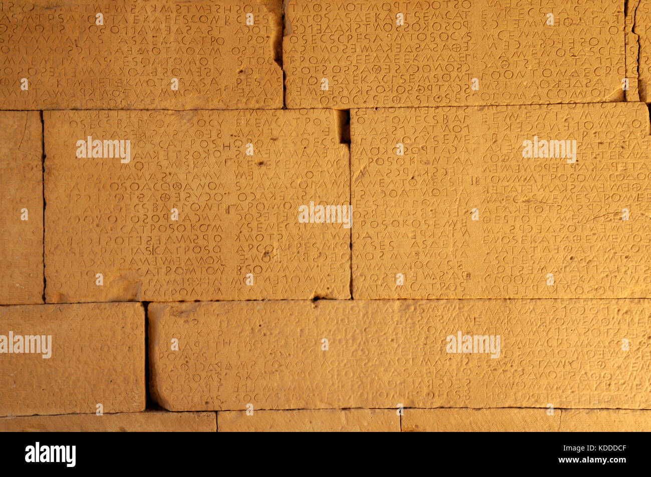 The Gortyn Code, or Great Code, carved on stones forming a wall, are ...