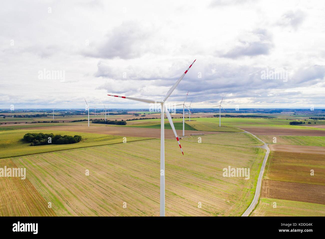 Aerial drone view on wind electricity generator. Green renewable energy ...