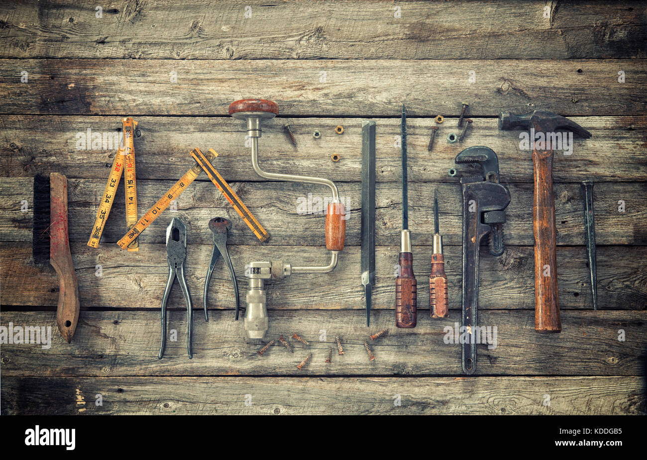 Old antique tools viewed from above on rough wood surface Stock Photo ...