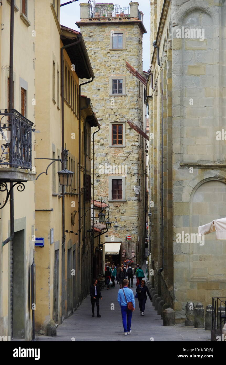 Arezzo, IT - SEP,30 2017 - Tourists visit the narrow roads of Arezzo ...
