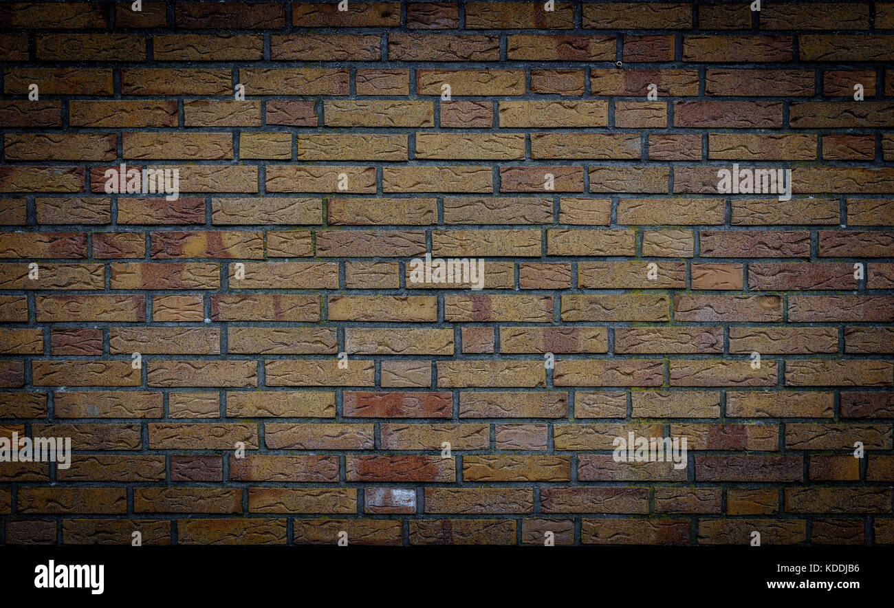 Background of yellow brick wall texture alone Stock Photo - Alamy