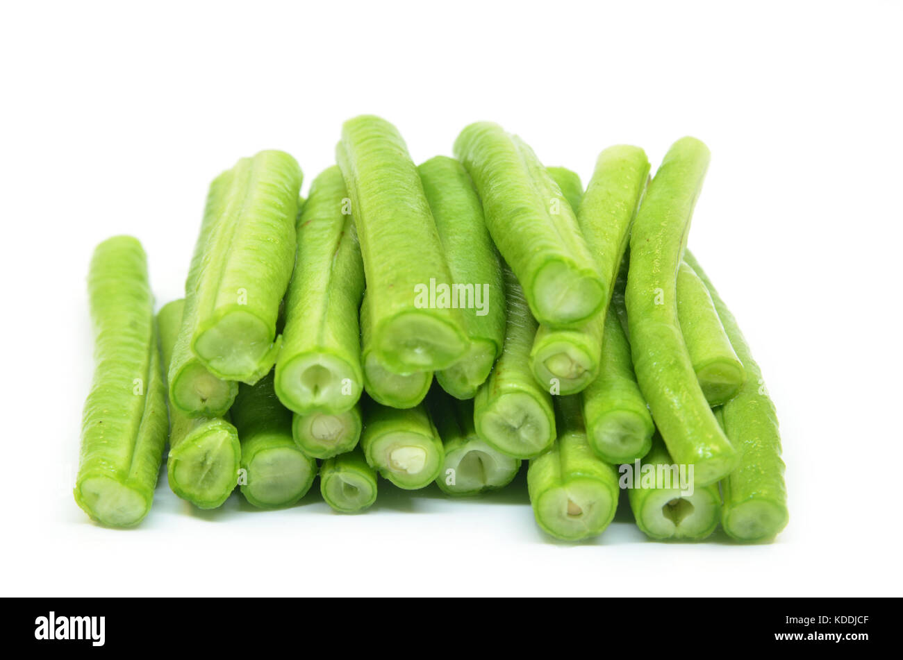 Chopped long beans isolated on white background Stock Photo - Alamy