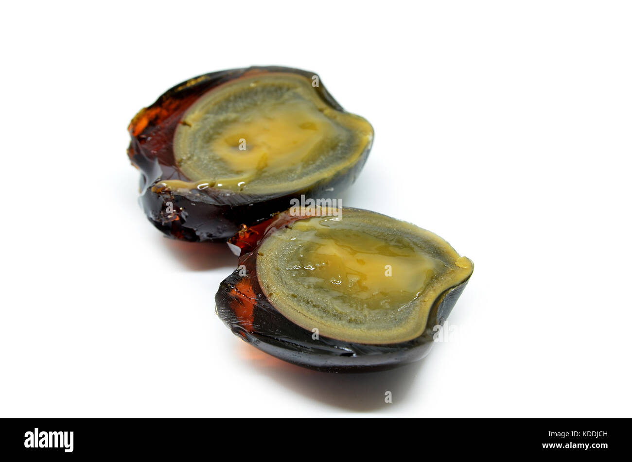 Chinese century eggs isolated on white background Stock Photo - Alamy