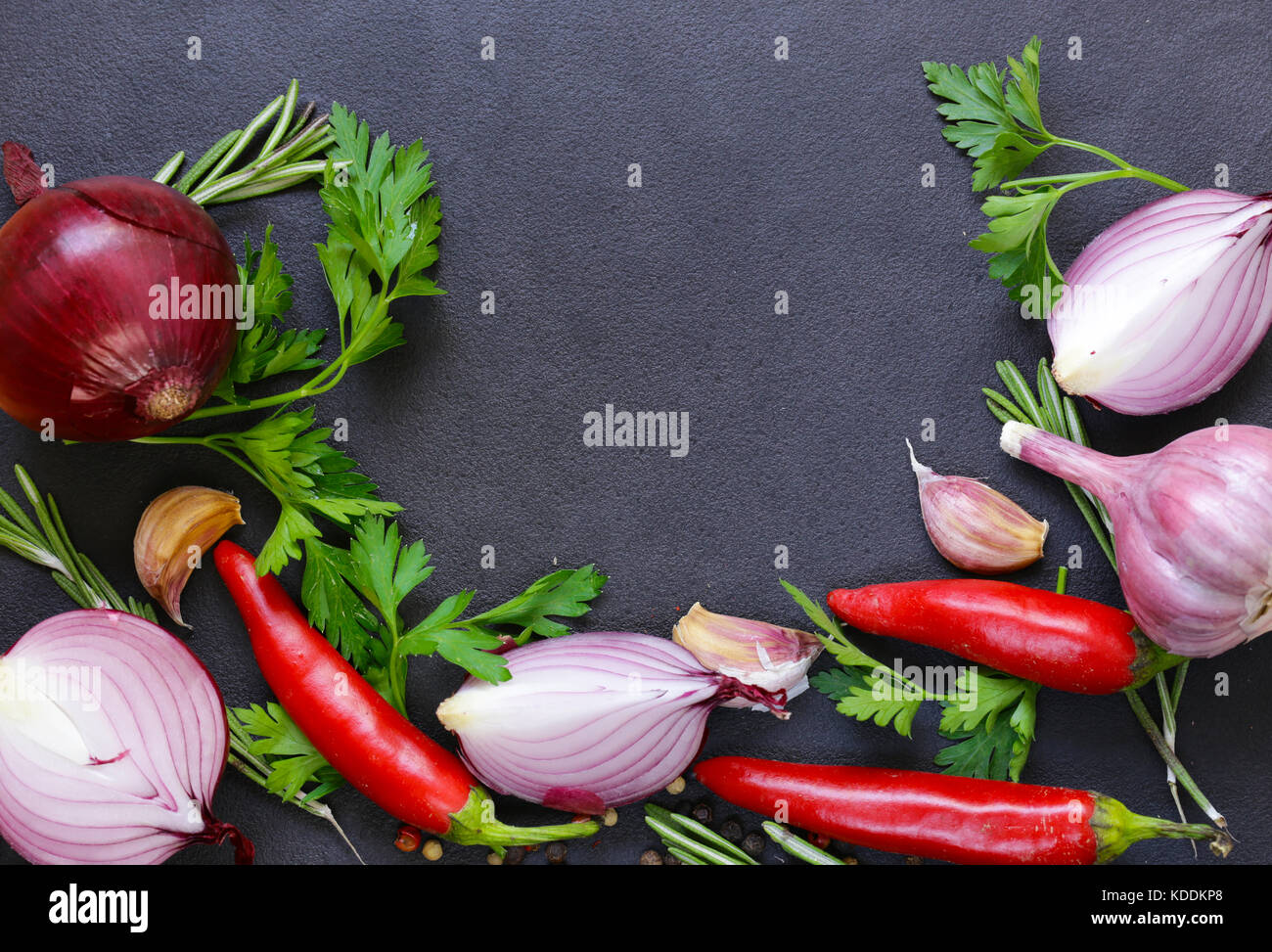 Food background - red onion, garlic, pepper, vegetables and herbs Stock ...