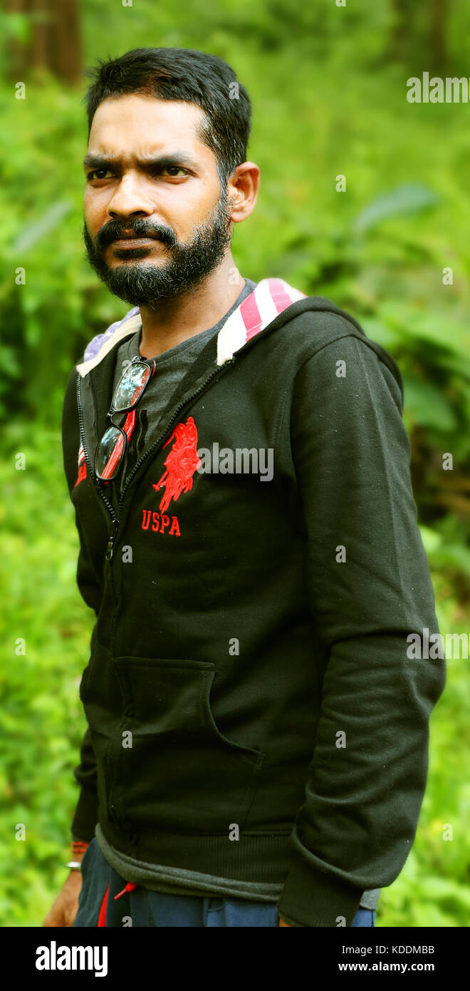 Handsome man looking outside Stock Photo - Alamy