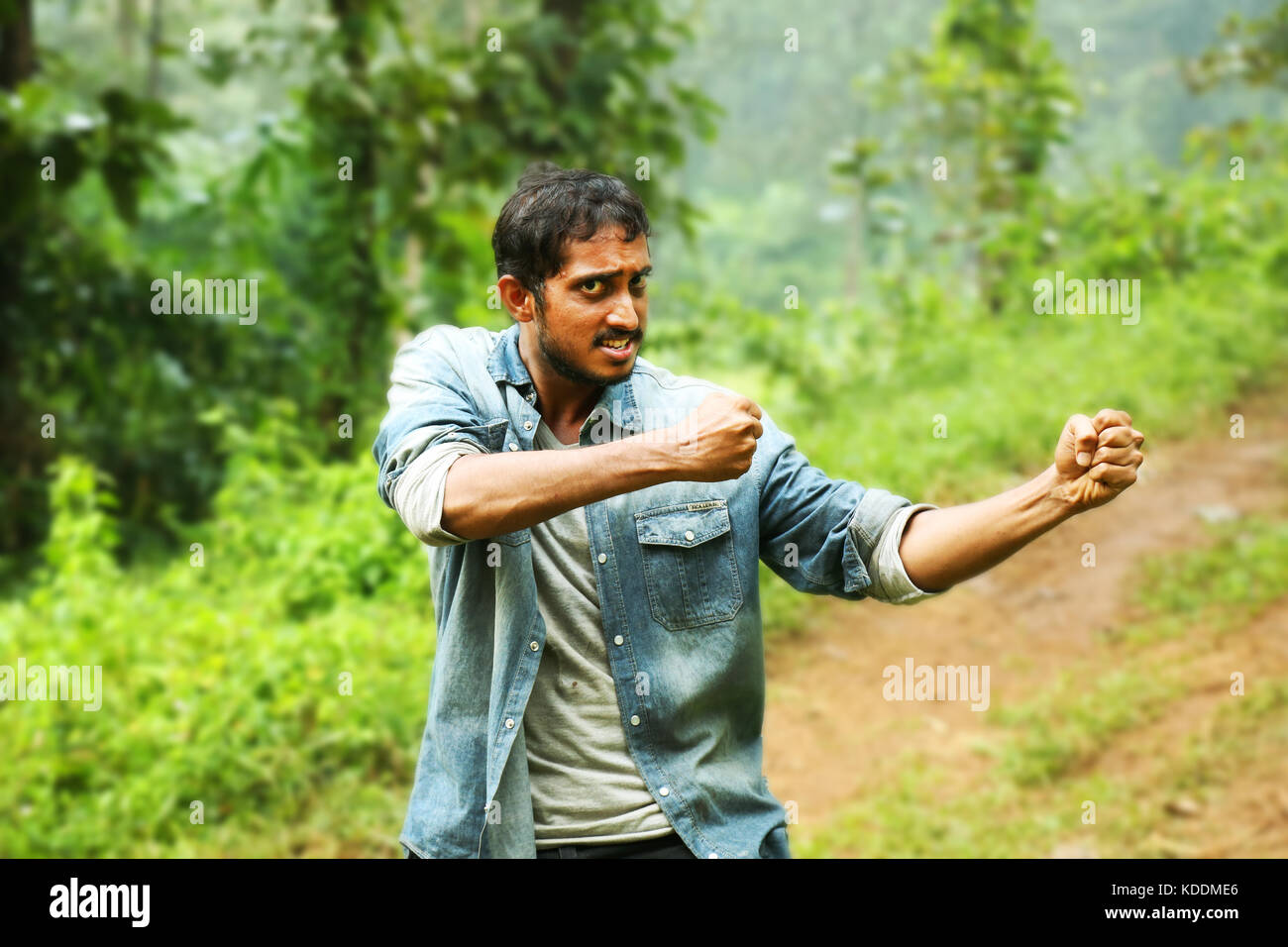 Fighter posing on camera Stock Photo - Alamy