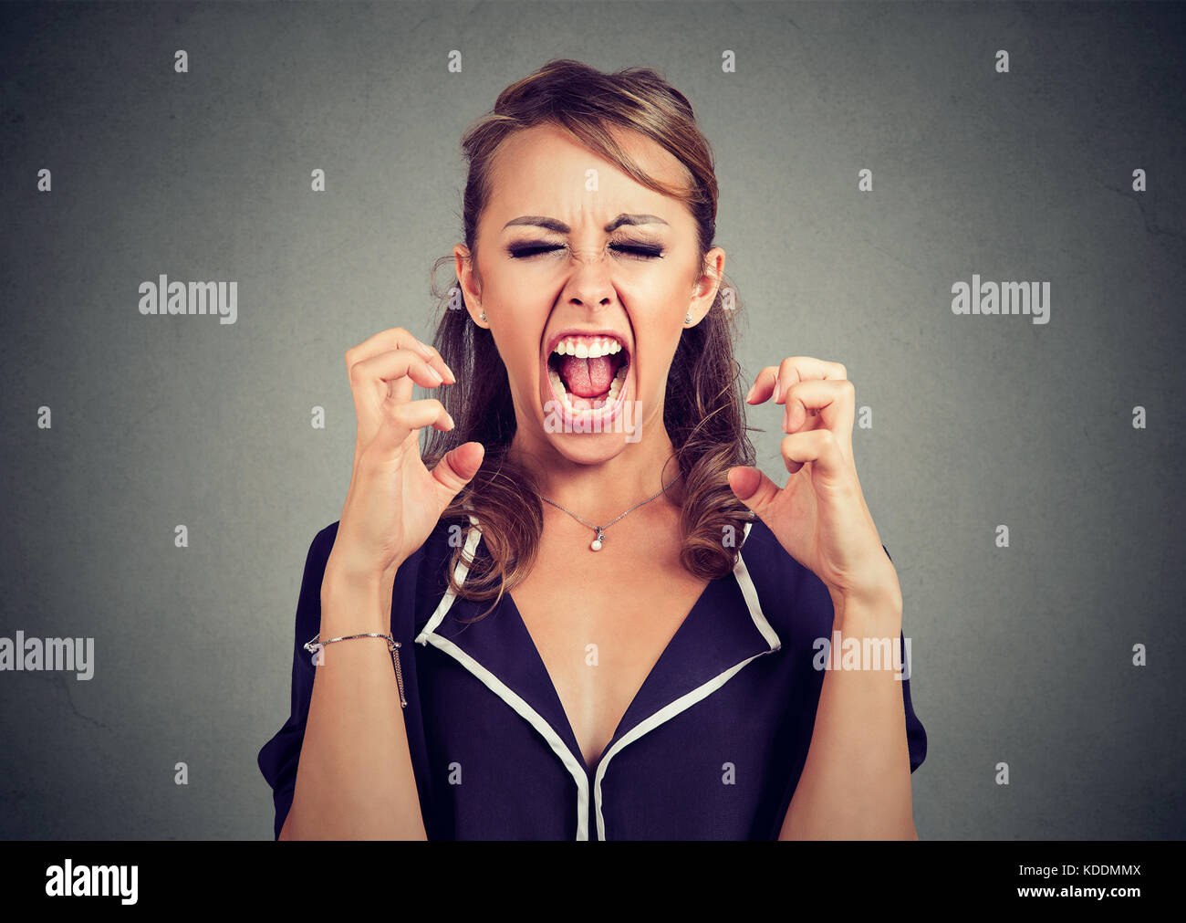 Angry frustrated young woman screaming Stock Photo - Alamy