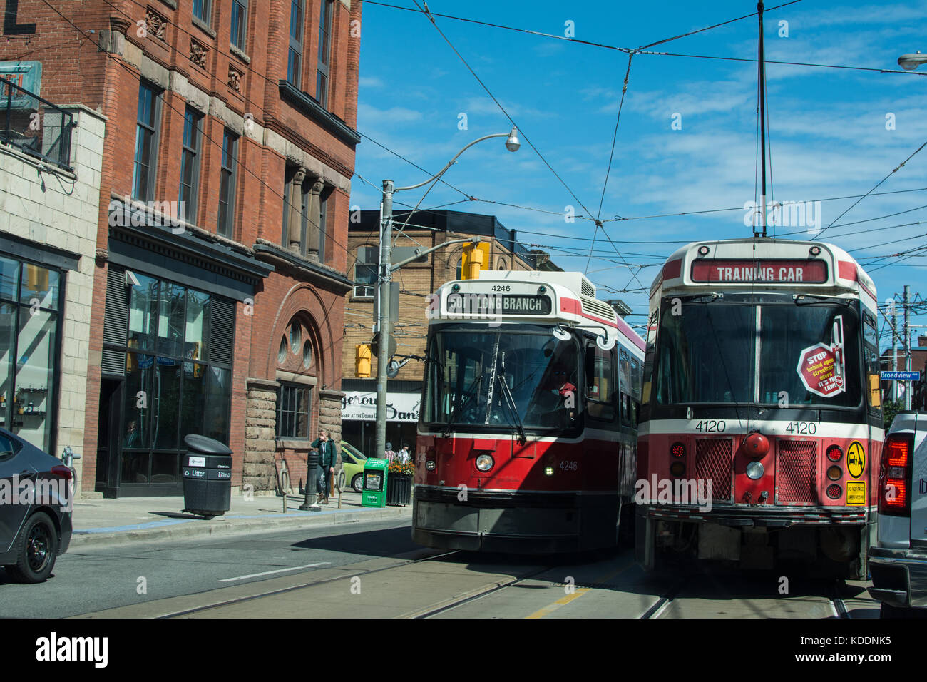 Electric tram or bus in Toronto Canada two training car overhead cables ...
