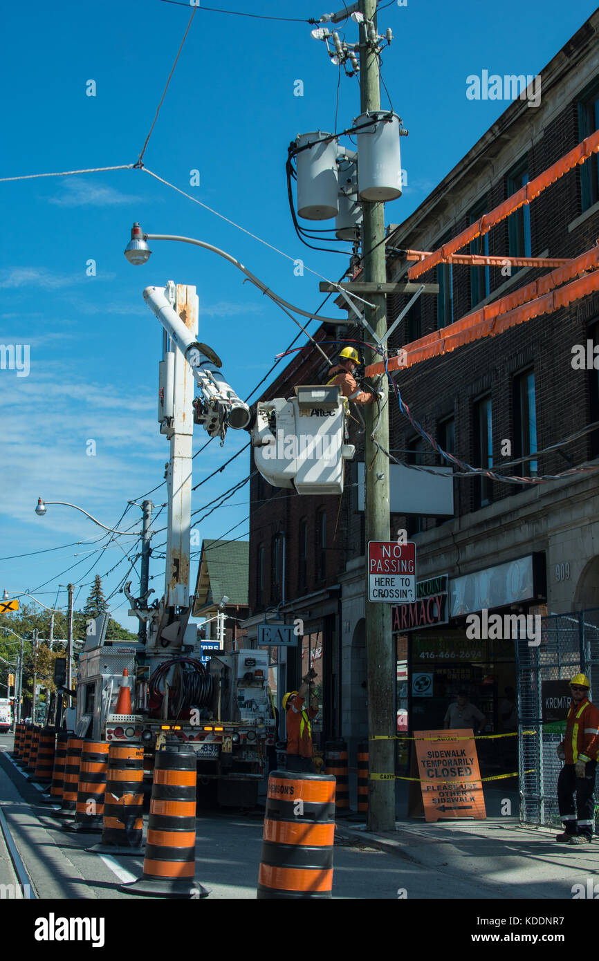 Toronto Canada electric electricity bollards orange black wall fence ...