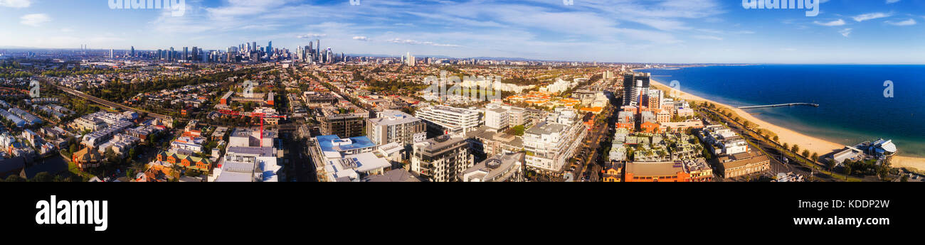 Port Philip bay sandy beach to Melbourne city CBD in elevated aerial ...