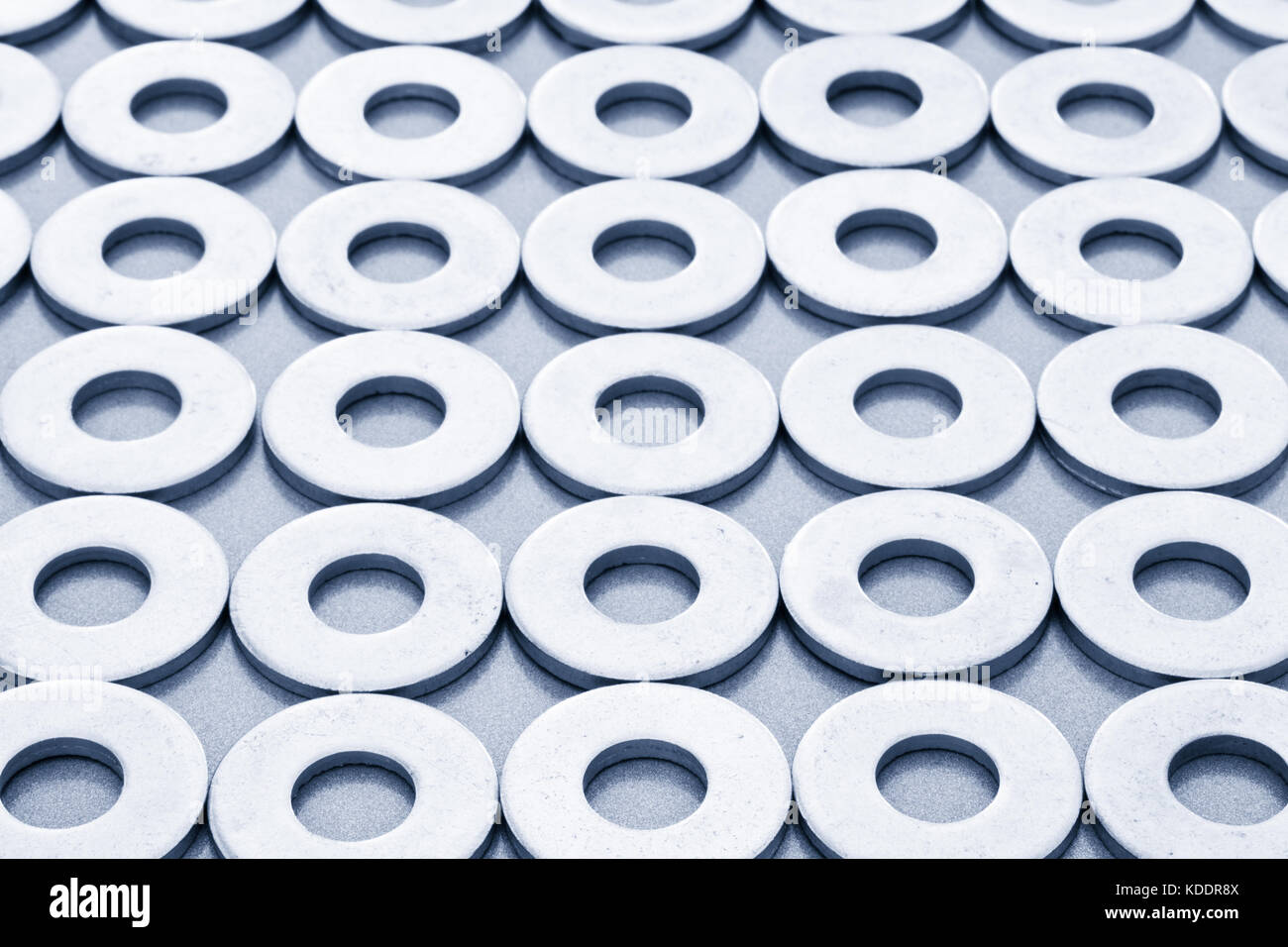 Closeup view of mechanical washers in rows Stock Photo - Alamy