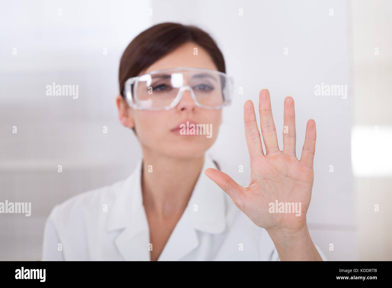 Portrait Of Female Scientist Touching The Screen With Her Finger Stock ...