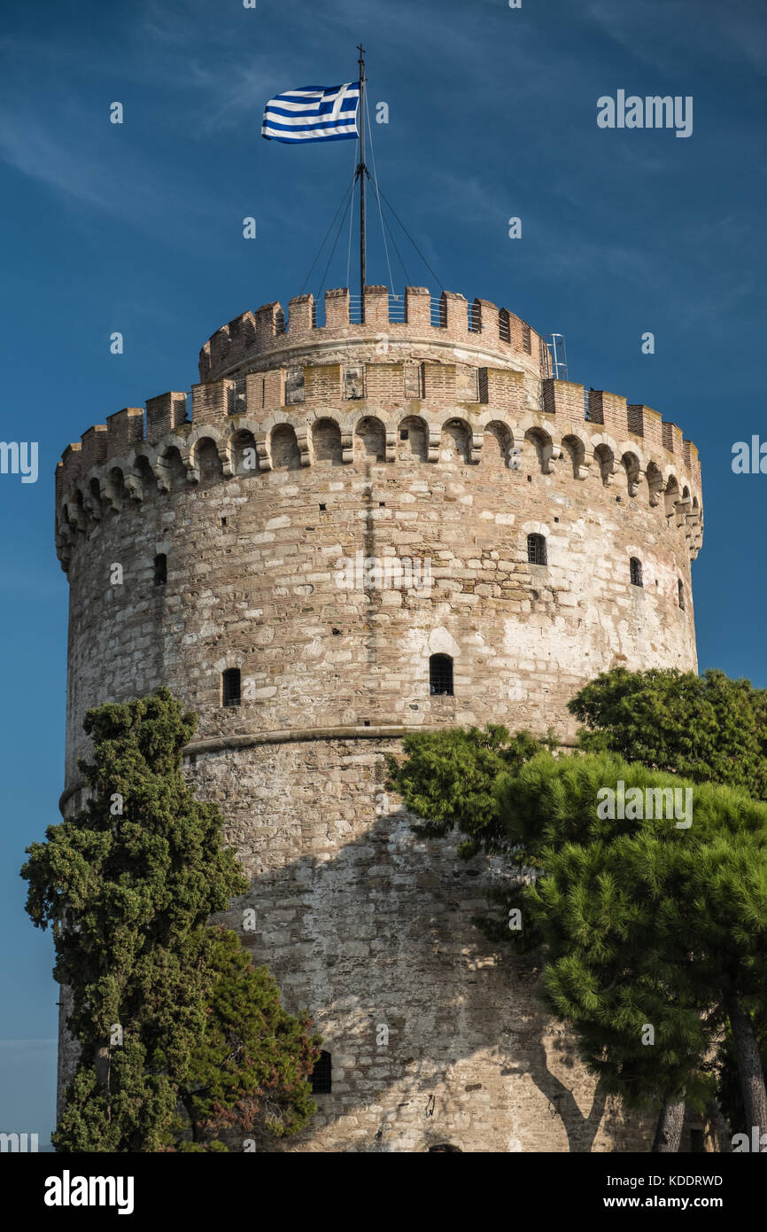 Ancient stone tower with Greek flag on the top Stock Photo - Alamy