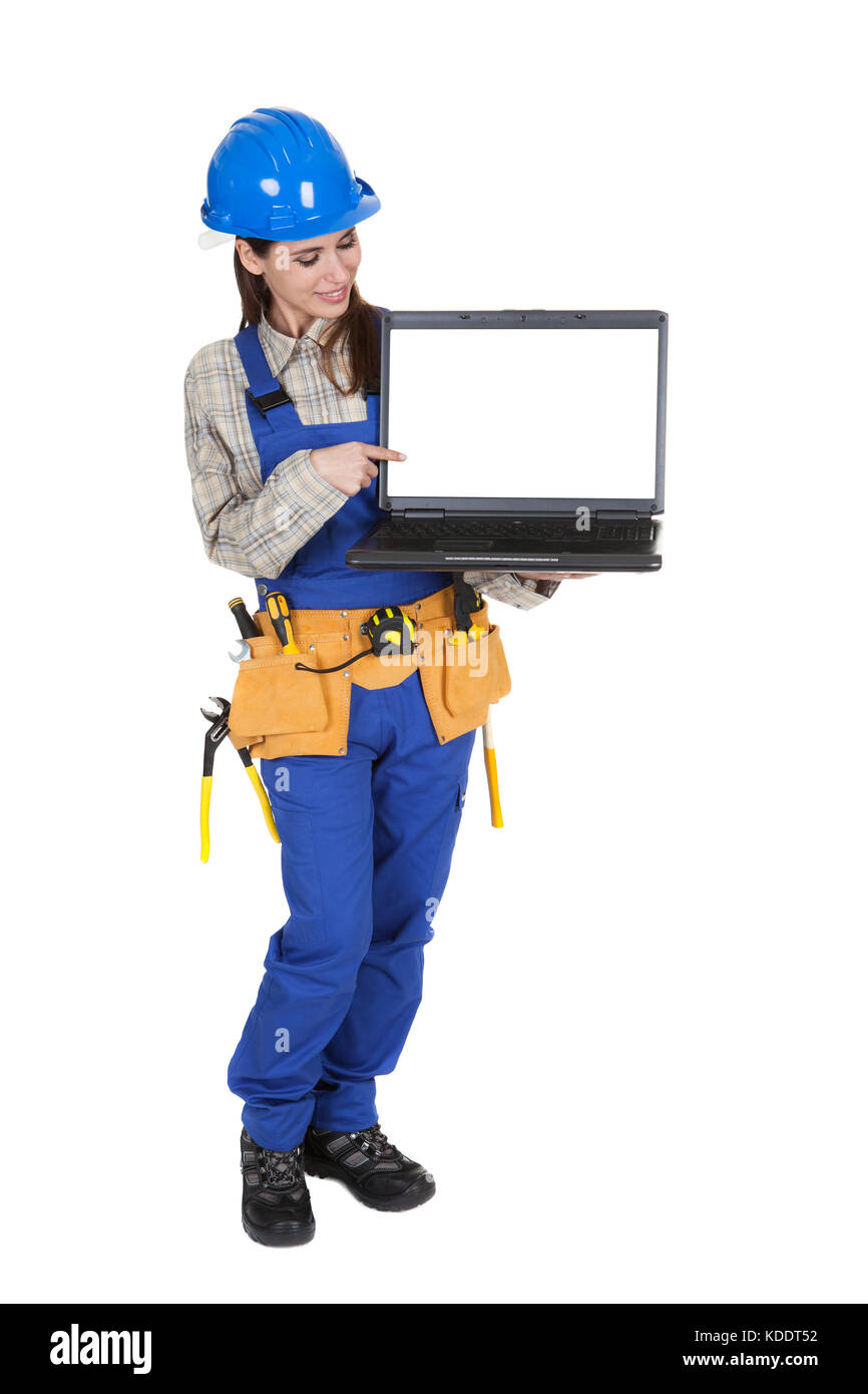 Portrait Of Female Worker Pointing On Laptop Stock Photo - Alamy
