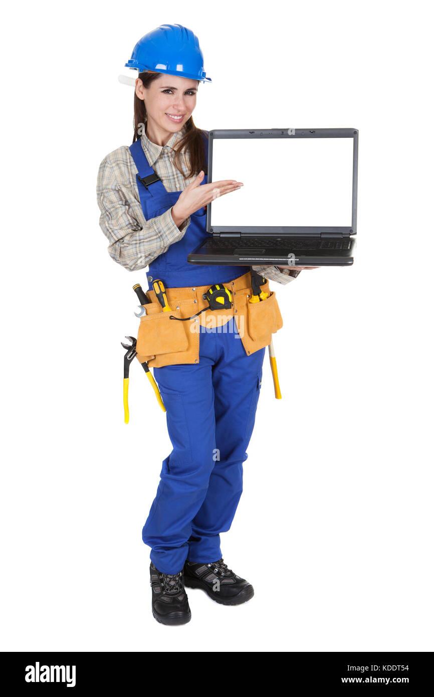 Portrait Of Female Worker Pointing On Laptop Stock Photo - Alamy