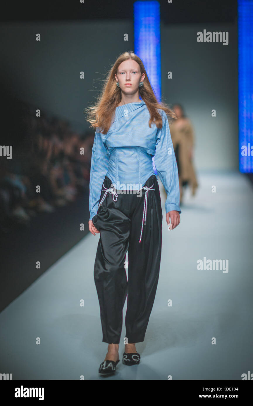 Shanghai, China. 13th October, 2017. A model presents a creation at the ...