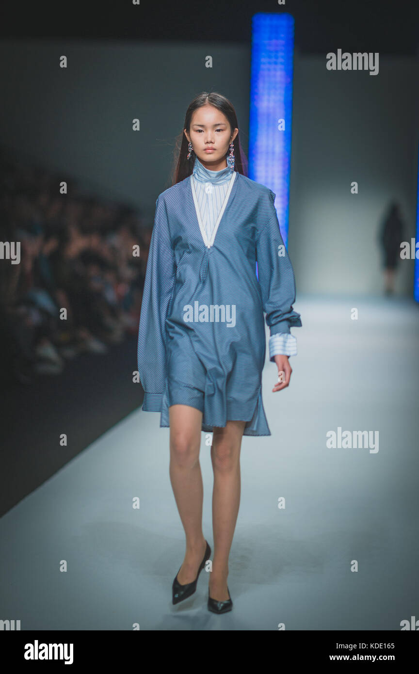 Shanghai, China. 13th October, 2017. A model presents a creation at the ...