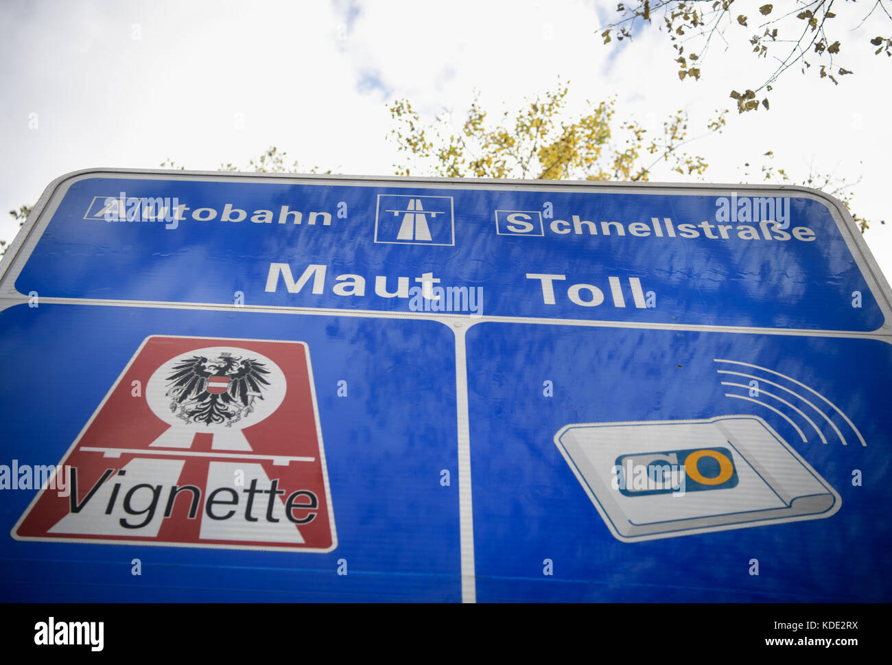 A road sign indicates the prevailing motorway toll in Austria at the ...