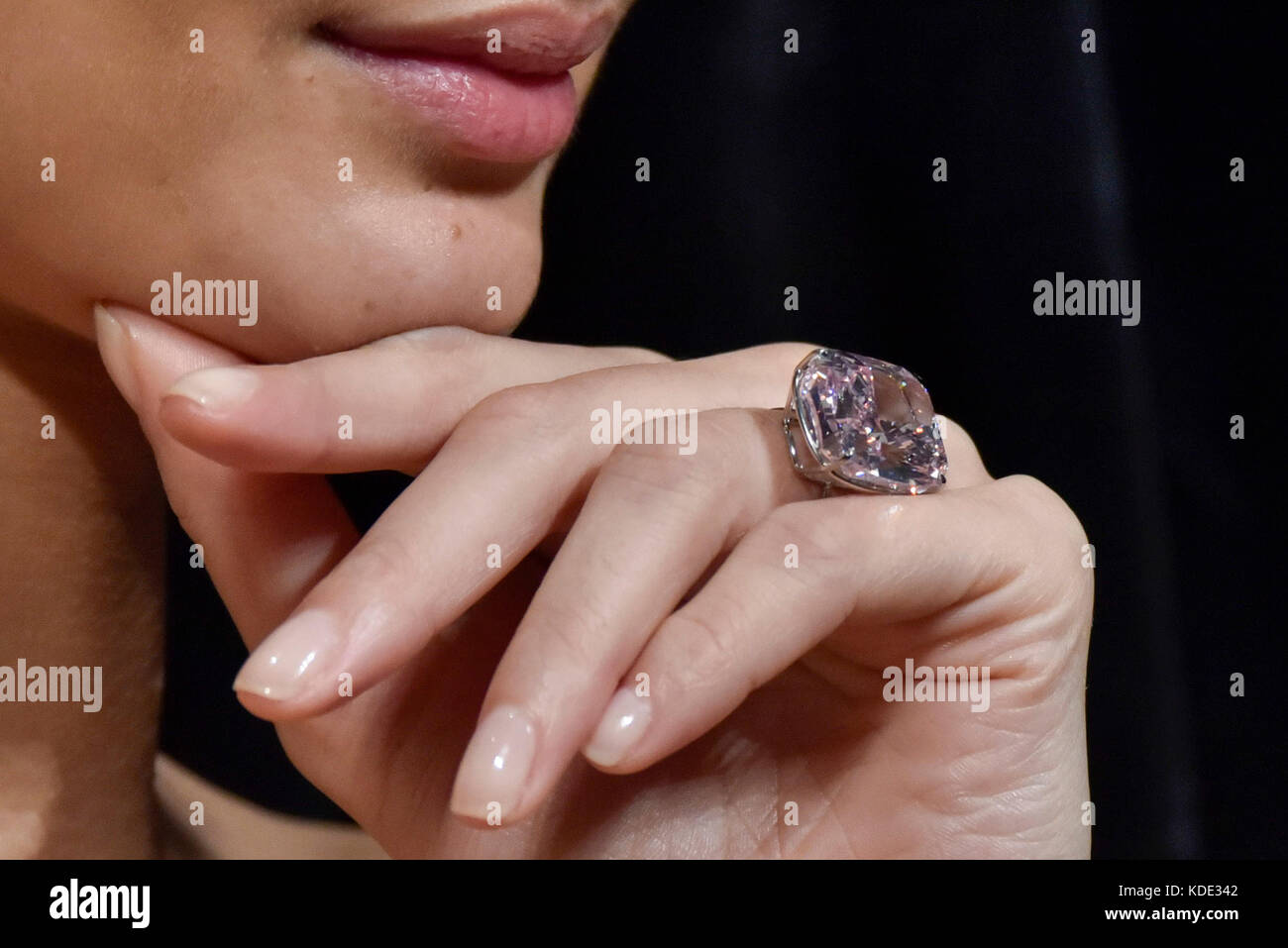 London, UK. 13 October 2017. A model presents "The Raj Pink" diamond at ...