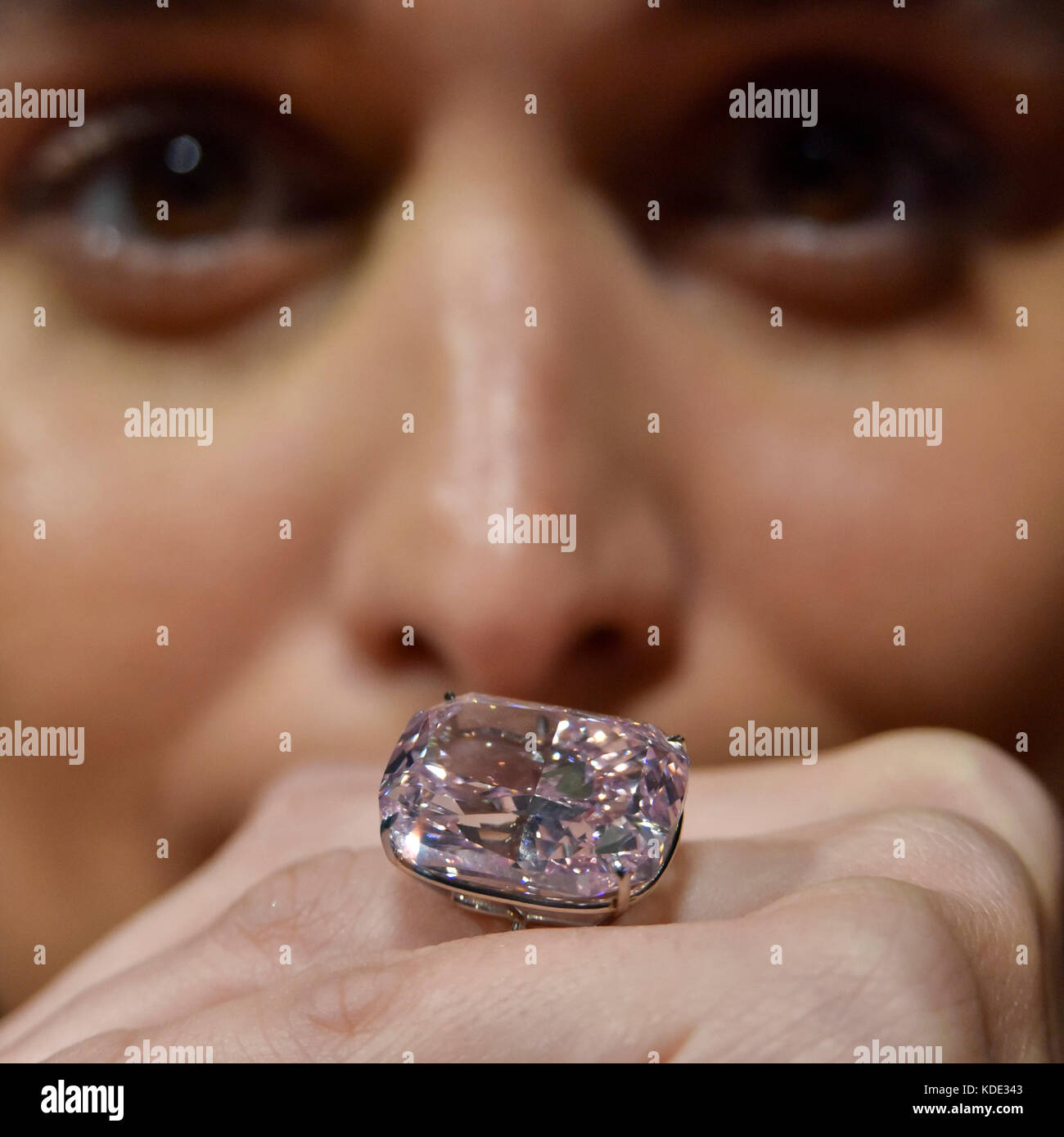 London, UK. 13 October 2017. A model presents "The Raj Pink" diamond at ...