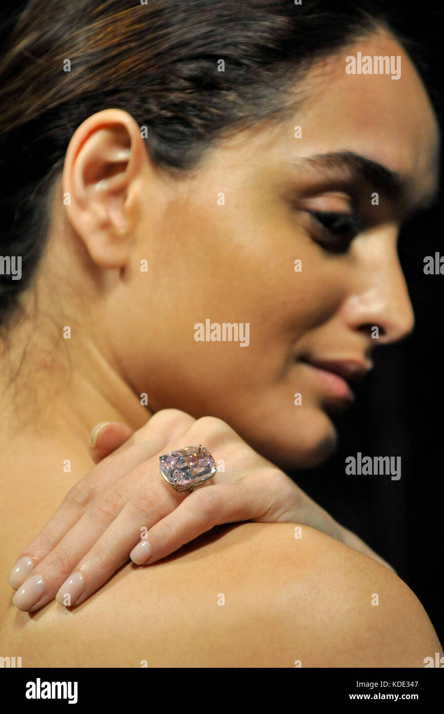 London, UK. 13 October 2017. A model presents "The Raj Pink" diamond at ...