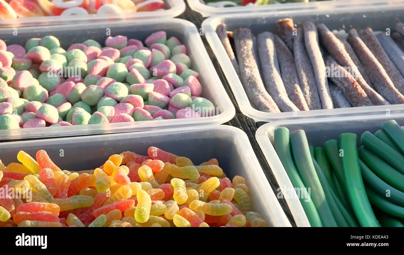 Plastic box with jelly sweets in candy shop Stock Photo - Alamy
