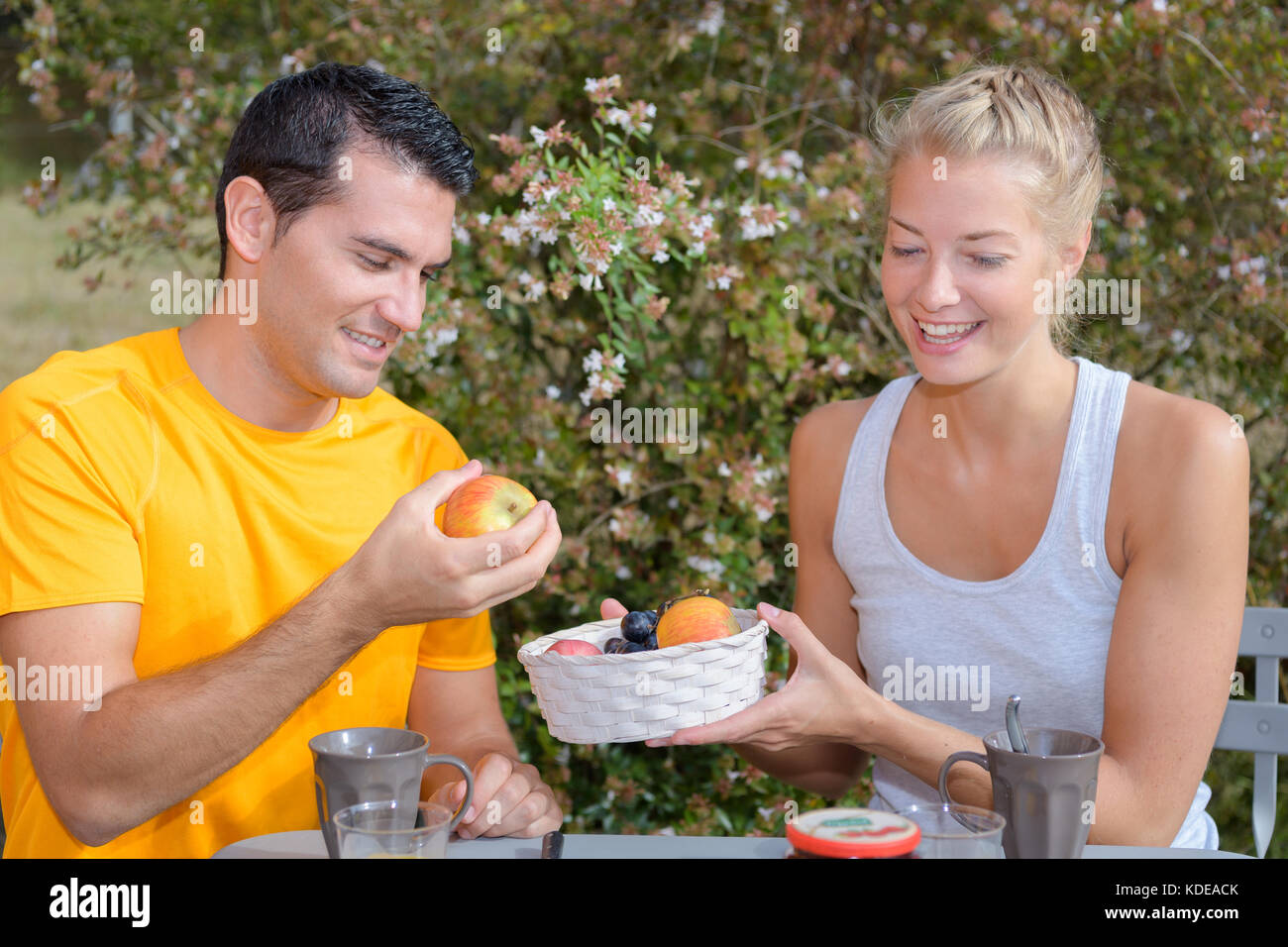 lovers eating fruits Stock Photo - Alamy