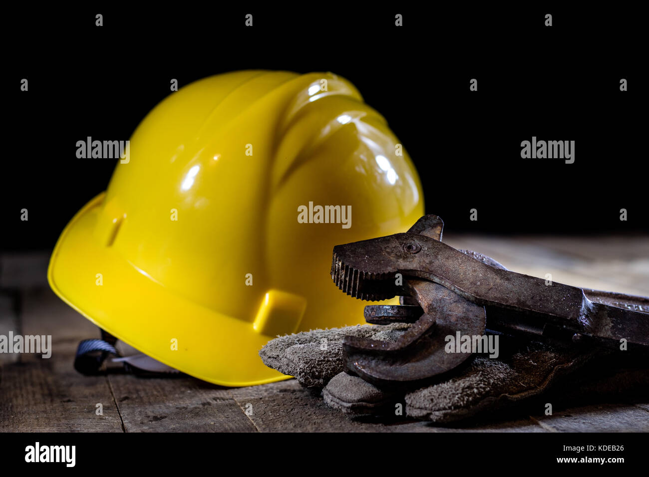 Hydraulics, tools for plumber on wooden table. Workshop, table and ...