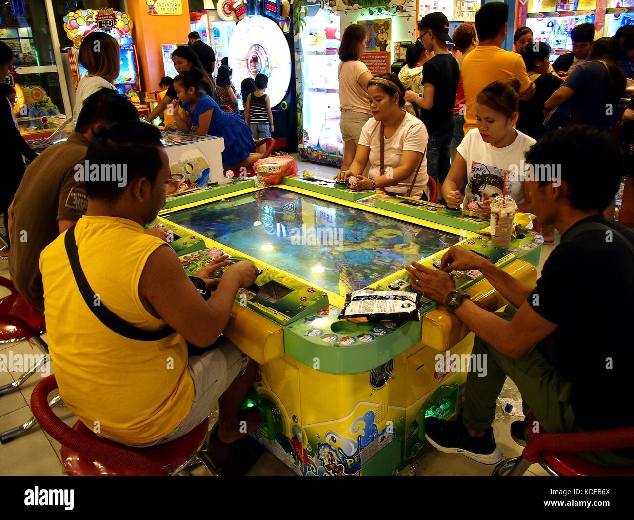 ANTIPOLO CITY, PHILIPPINES - OCTOBER 8, 2017: Customers enjoy video ...