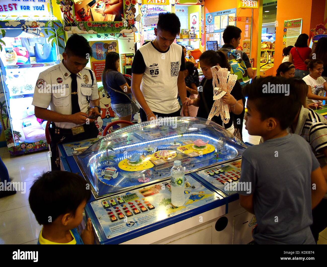 ANTIPOLO CITY, PHILIPPINES - OCTOBER 8, 2017: Customers enjoy video ...