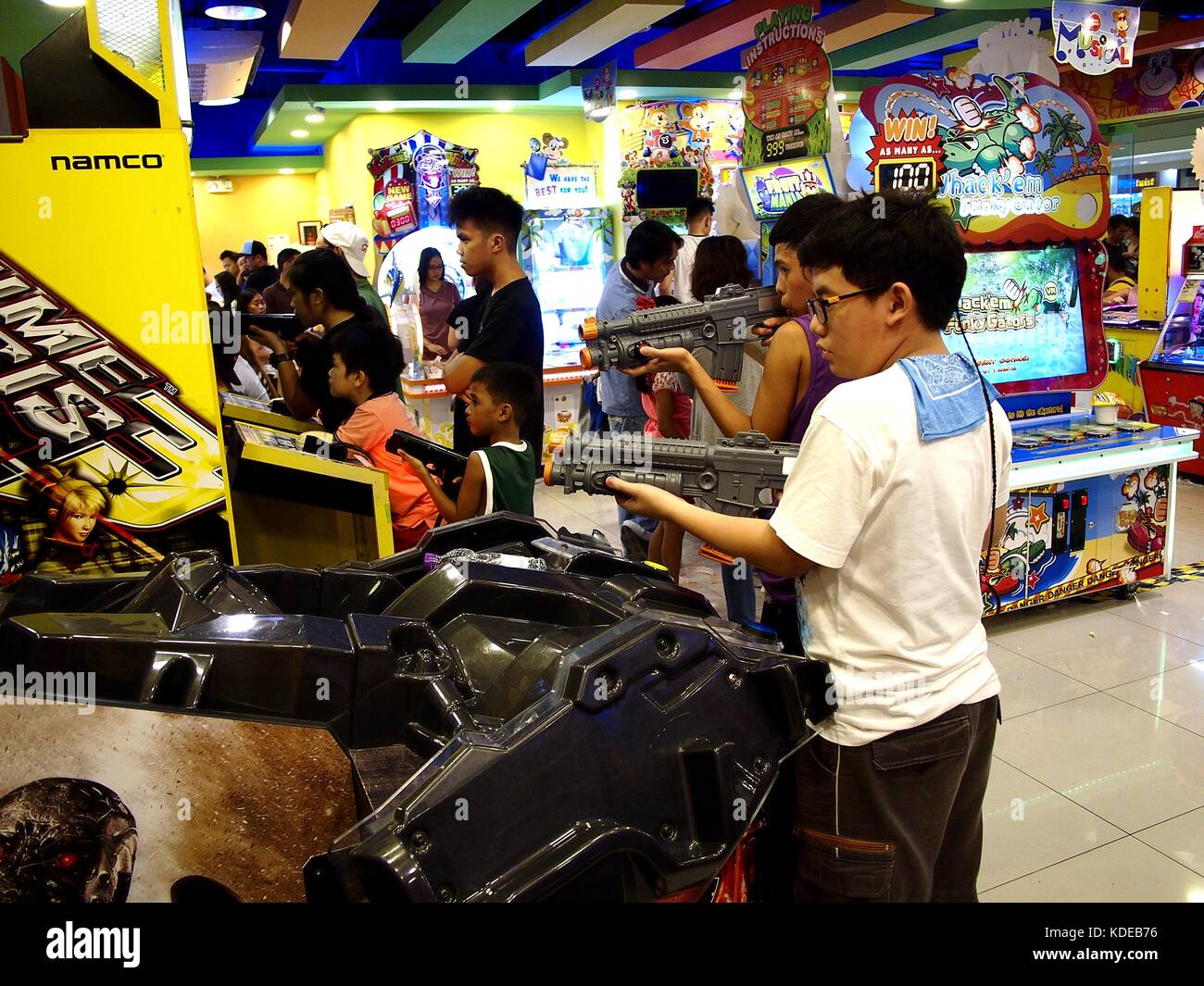 ANTIPOLO CITY, PHILIPPINES - OCTOBER 8, 2017: Customers enjoy video ...