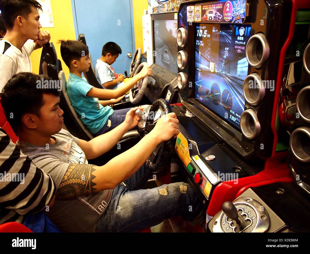 ANTIPOLO CITY, PHILIPPINES - OCTOBER 8, 2017: Customers enjoy video ...