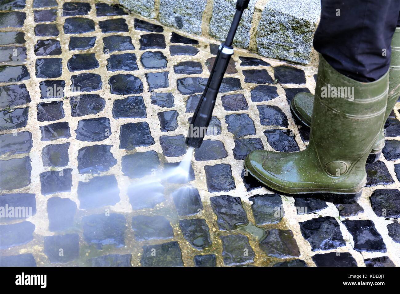 An Image of walkway cleaning - high pressure cleaner Stock Photo - Alamy