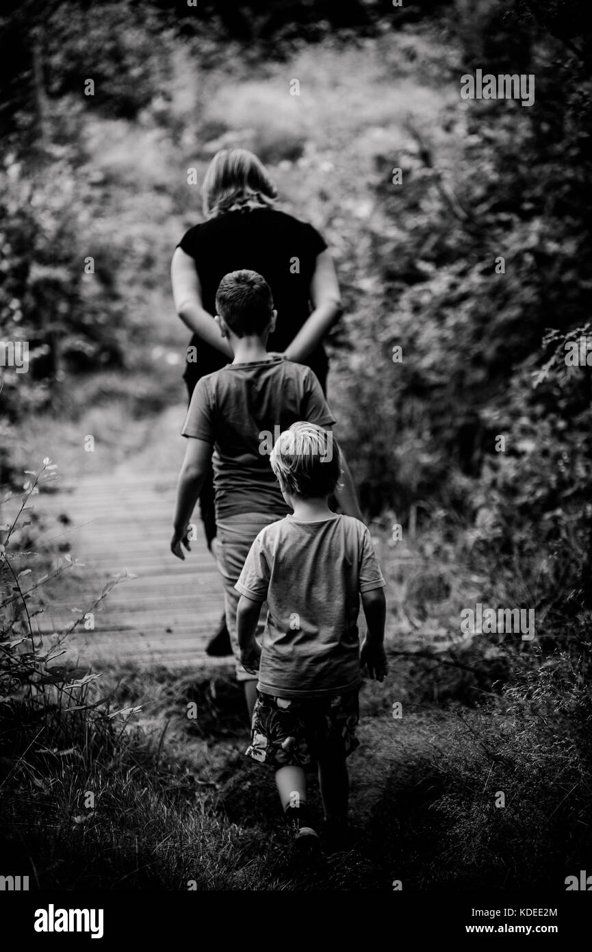 Mother leading the way Stock Photo - Alamy
