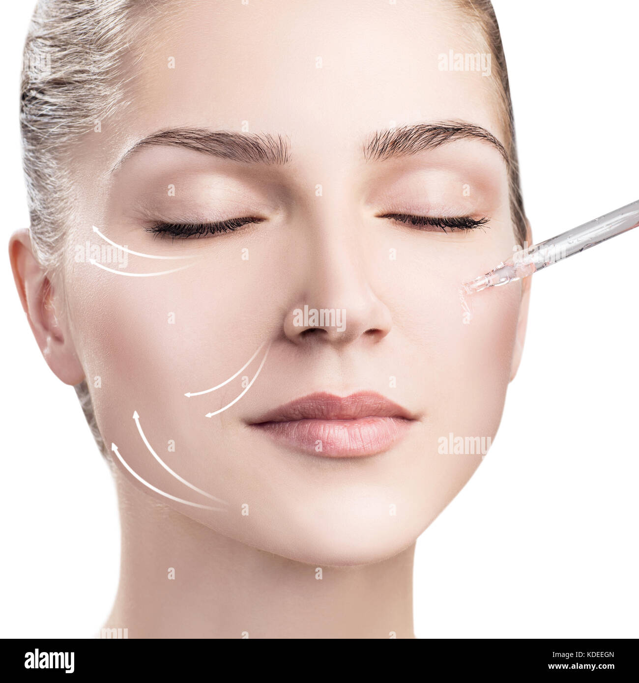 Woman's face with lifting arrows and cosmetics oil Stock Photo - Alamy