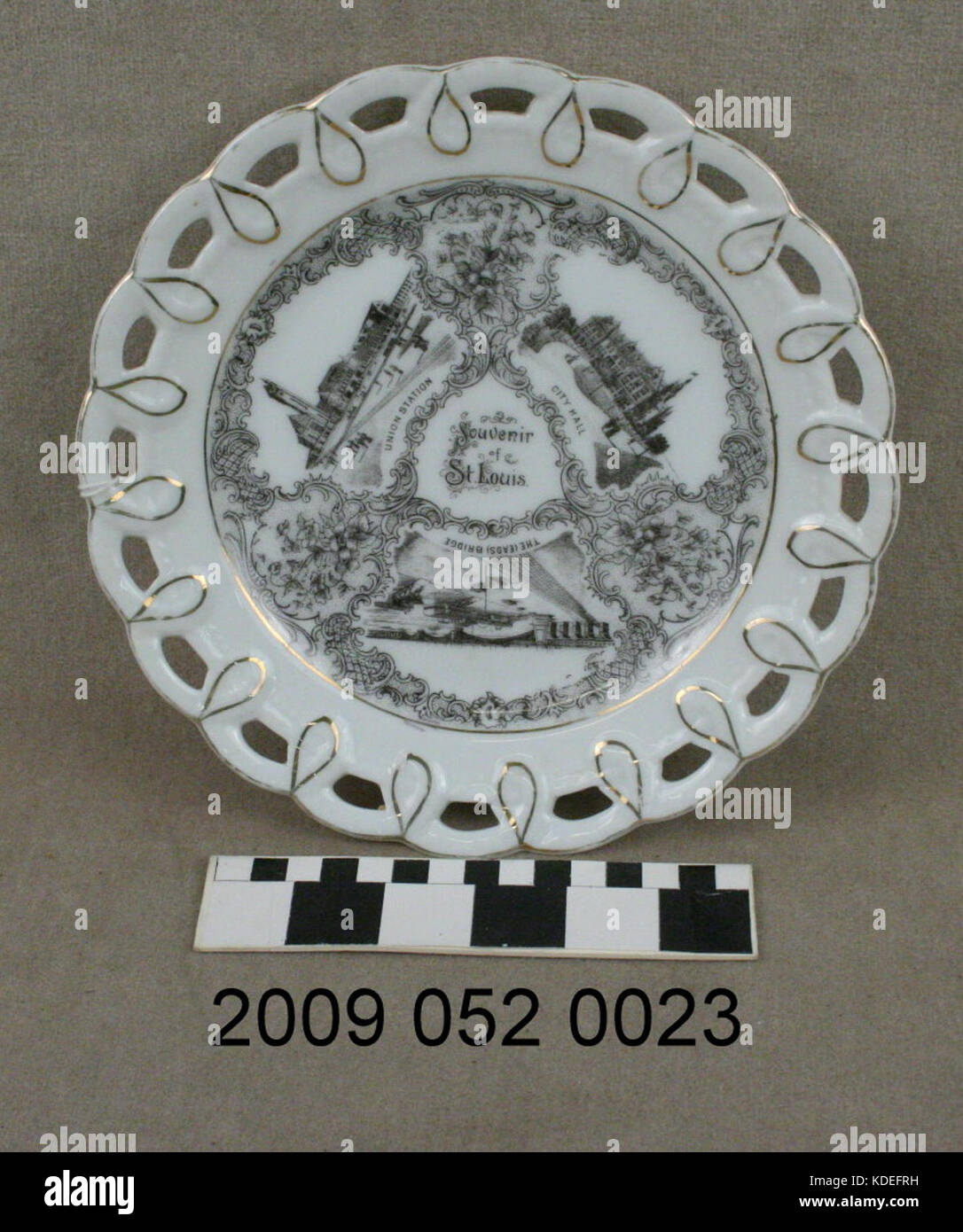 This is a souvenir plate made by Carlsbad Victoria, featuring black ...