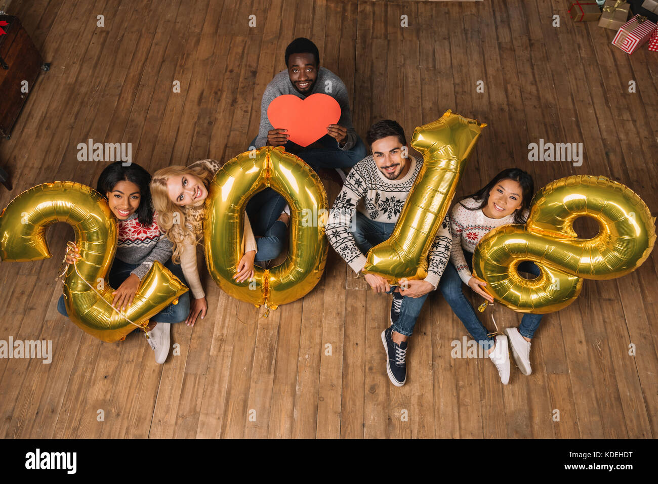 multicultural friends with balloons and paper heart Stock Photo - Alamy