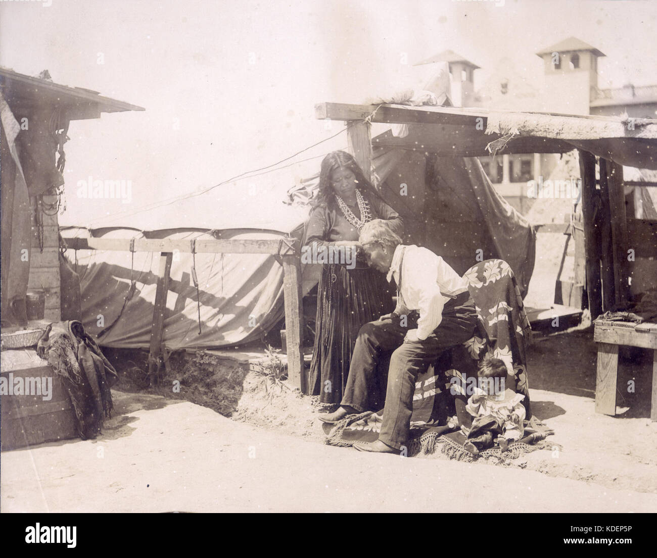Navaho Indian cutting hair (1904 World's Fair Stock Photo - Alamy