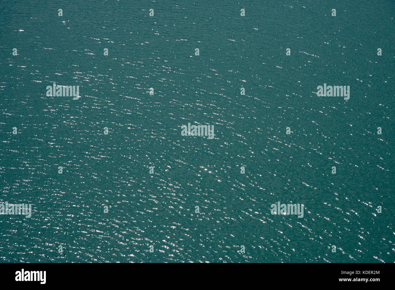 Pure turquoise Pacific ocean waters in full frame background in Noumea ...