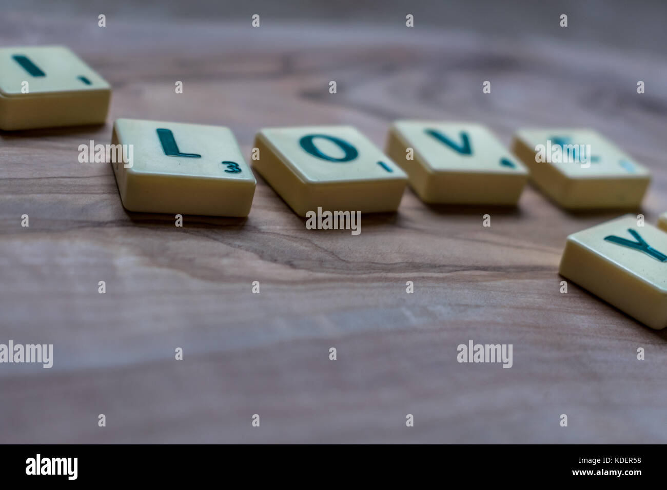I love you romantic words scrabble tile lettering Stock Photo - Alamy