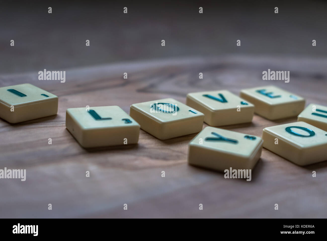 I love you romantic words scrabble tile lettering Stock Photo - Alamy